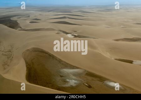 Aerial photography the Namibian coast where the sand dunes meet the ...