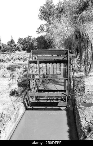 An irrigation canal and working waterwheel replica in Keimoes in the ...