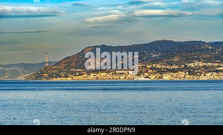 The mountainous coasts of Calabria in the Strait of Messina. The cities ...