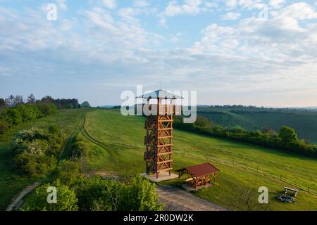 Aerial view of wooden lookout tower on the top of Velka Homola in ...