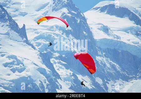 Two people paragliding at the mount Montblanc, Chamonix, France, Europe ...