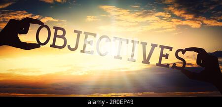 Objectives - human hands holding black silhouette word, gradient ...