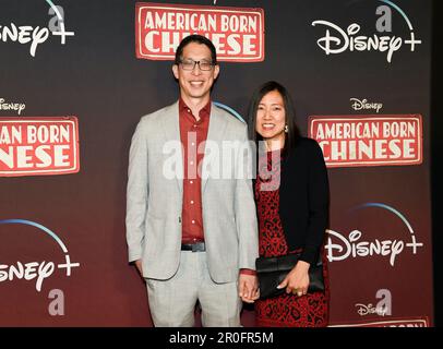 Gene Luen Yang, left, and wife Theresa Yang attend the premiere of the ...