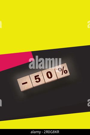 Minus 50 percent phrase on wooden blocks on black background. Sale ...