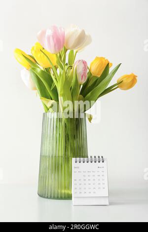 The August 2022 desk calendar with plant on wooden table Stock Photo ...