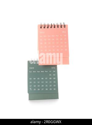 Flip calendars on white background Stock Photo - Alamy