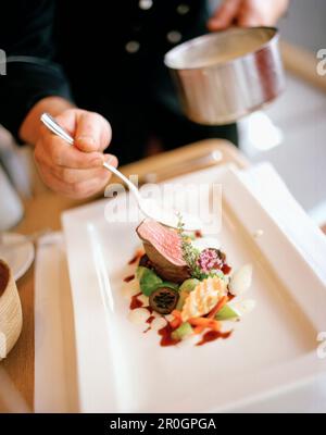 Person getting some food being served at a wedding reception Stock ...