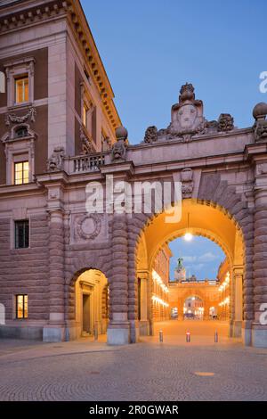 A vertical shot of a street between old medieval stone buildings in ...