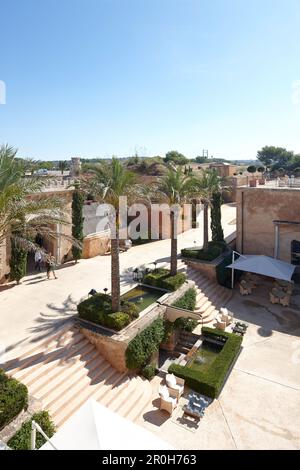 Courtyard with restaurant La Fortaleza Las Jaimas, Hotel Cap Rocat ...
