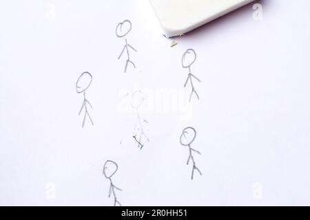 Cancellation culture concept. The drawn figure of a person is erased ...