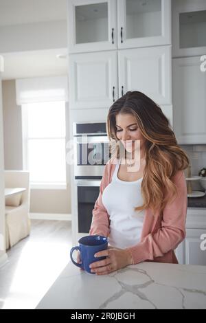 beautiful woman having a cuppa Stock Photo - Alamy