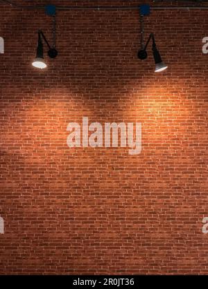 Spot light and brick background Stock Photo - Alamy
