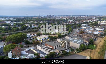 An aerial view of cityscape Mannheim surrounded by buildings and water ...