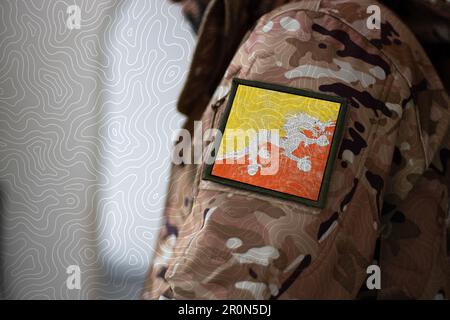 Flag of Bhutan on military uniform. Army, armed forces, soldiers ...