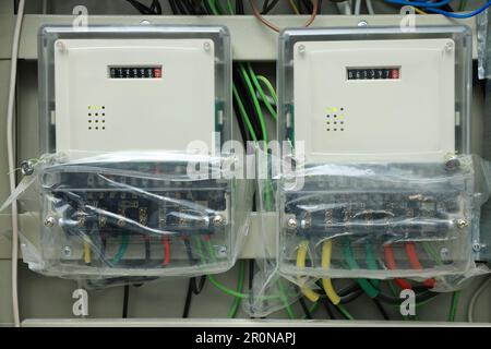 Electric meters and wires in fuse box Stock Photo - Alamy