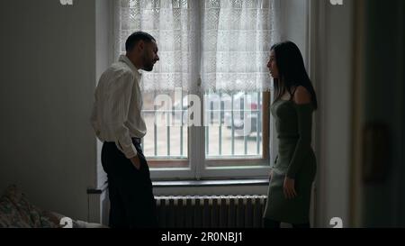 Candid couple fighting, man pointing finger blaming for problems ...