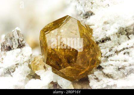 green vesuvianite (also known as idocrase) crystal. macro detail ...