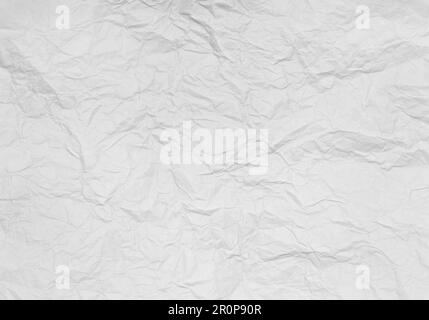 crumpled paper gray sheet on white wooden background Stock Photo - Alamy