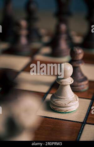 Close up of a white king's pawn opening on a chessboard Stock Photo - Alamy