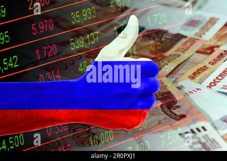 Economy graph: thumb up with Russia flag, stock market indicators and ...