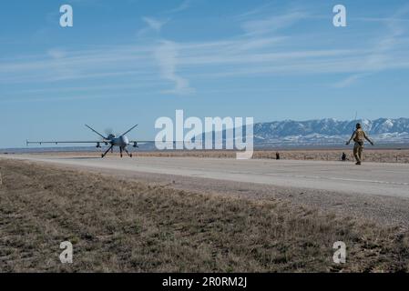 An MQ-9 Reaper lands on Highway 287 during exercise Agile Chariot in ...