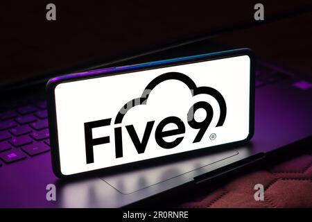 In this photo illustration, a five9 logo is seen displayed on a ...