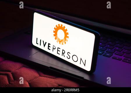 In this photo illustration, the LivePerson logo is displayed on a ...