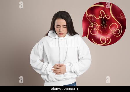 Parasites under microscope and woman suffering from helminthiasis Stock ...