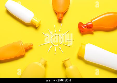 Drawing of sun made with sunscreen cream on yellow background Stock ...