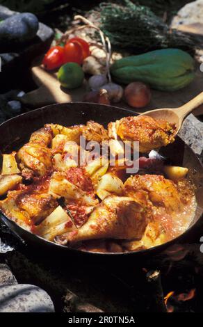 A pot of Brown Stew Chicken, a classic Jamaican dish Stock Photo - Alamy
