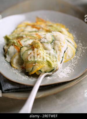 Baked zucchini courgette bechamel sauce and ground minced meat and ghee ...