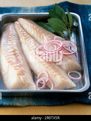 Raw cod fillets Stock Photo - Alamy