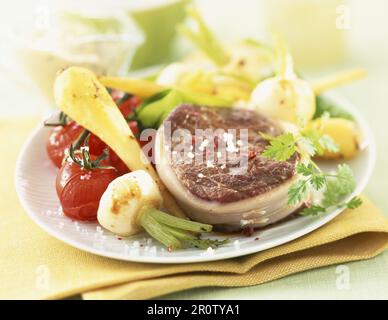 tournedos with new vegetables Stock Photo - Alamy