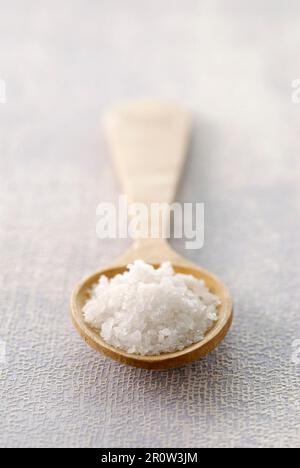 Spoonful of coarse salt Stock Photo - Alamy