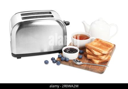 Toaster, bread with jam, blueberries and tea on white background Stock ...