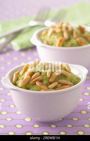 Zucchini and pesto mousse with pine nuts Stock Photo - Alamy