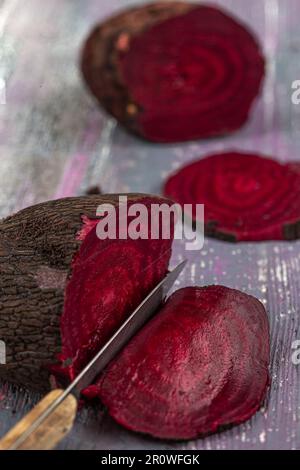 Beet, cut in half Stock Photo - Alamy