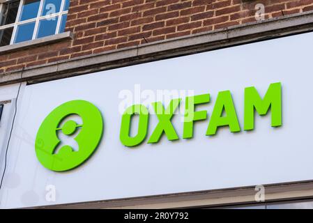 Signs above Oxfam charity shop in Tamworth, Staffordshire, UK Stock ...