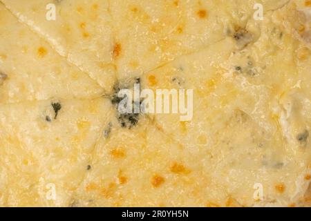 Four cheese pizza as a background. Junk food Stock Photo - Alamy