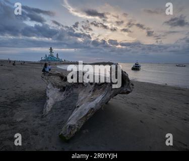 statue of Varuna (The God of Sky, Water and Ocean) in Pantai Jerman ...