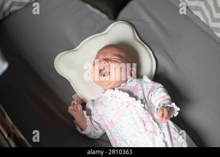 Crying child with NAP Stock Photo - Alamy