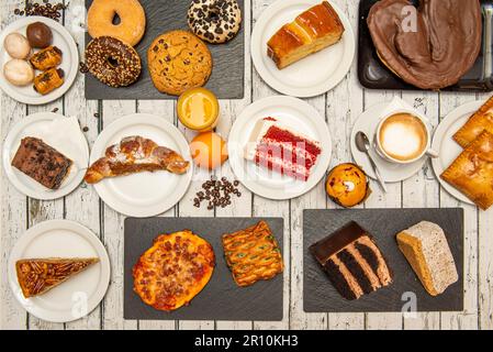 plates with assorted cakes Stock Photo - Alamy