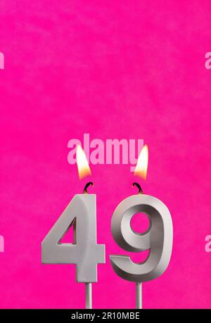 Birthday candle number 49 - Anniversary celebration in rhodamine red ...