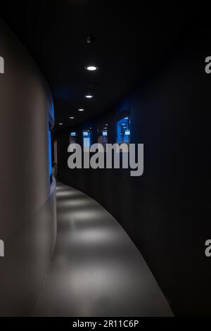 Illuminated Corridor with TV Screens in Switzerland Stock Photo - Alamy