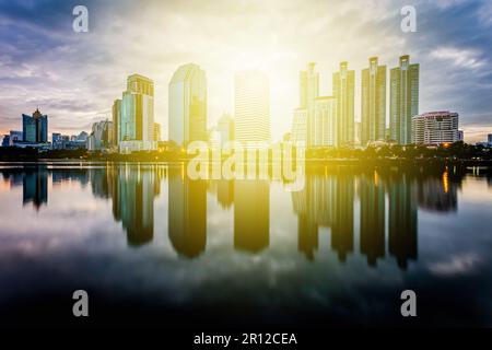 City building with water reflection before sunset background Stock ...