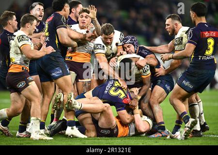 Aaron Pene of the Storm scuffles with Thomas Flegler of the Broncos ...