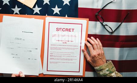 Folder With Classified Documents on Usa Flag Stock Photo - Alamy