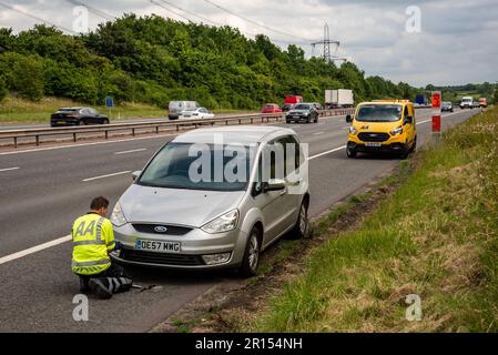 Car being recovered by an AA patrol on the M40 in Oxfordshire, UK Stock ...