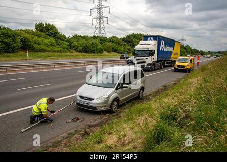 Car being recovered by an AA patrol on the M40 in Oxfordshire, UK Stock ...
