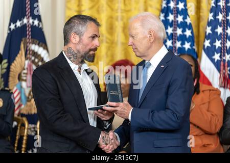 Former Metropolitan Police Officer Michael Fanone walks through the ...